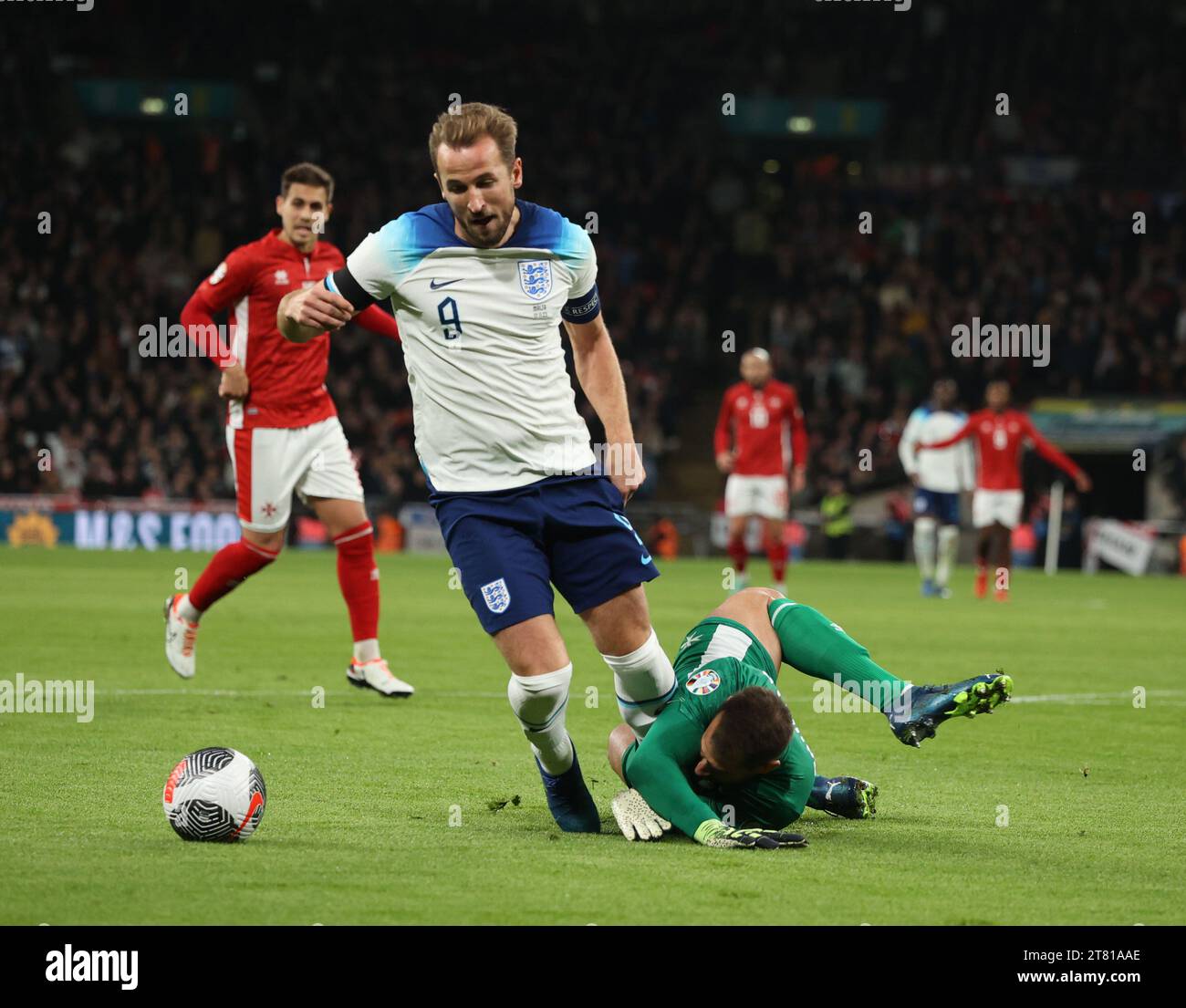 London, UK. 17th Nov, 2023. Harry Kane (E) brought down by Henry ...