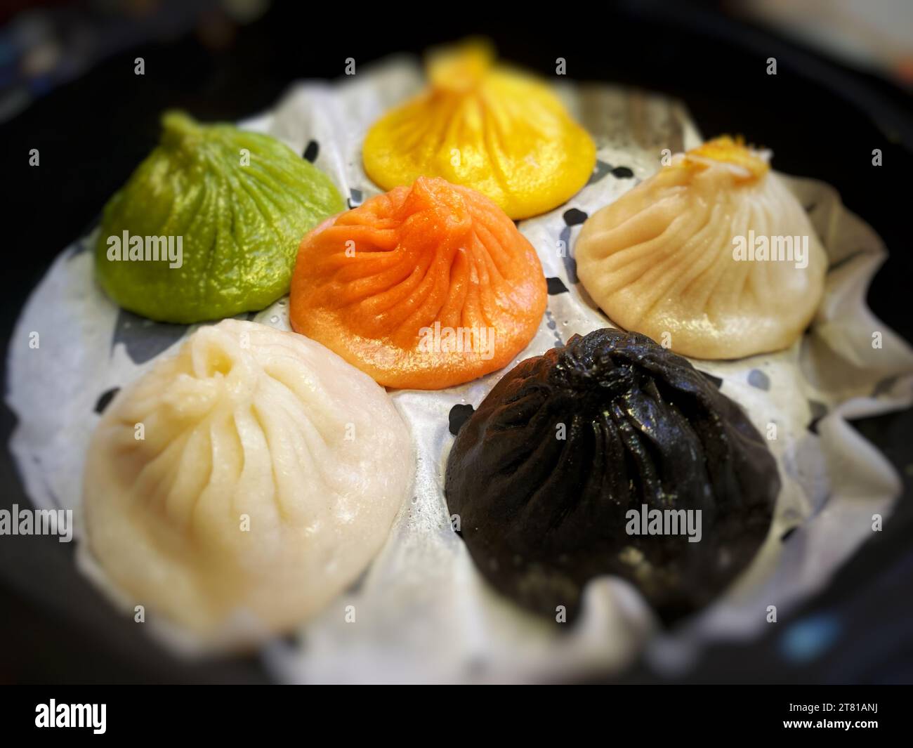 Six colorful dumplings Stock Photo - Alamy