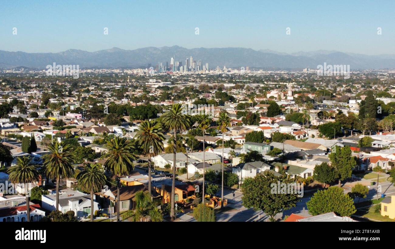 An aerial view of a city reveals a sprawling landscape of buildings ...