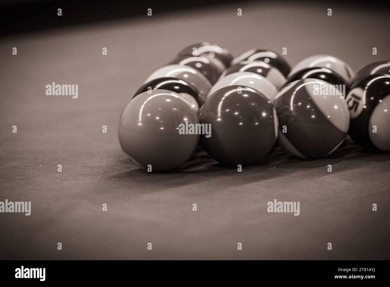 Billiard table setup featuring colorful pool balls, ready for an ...