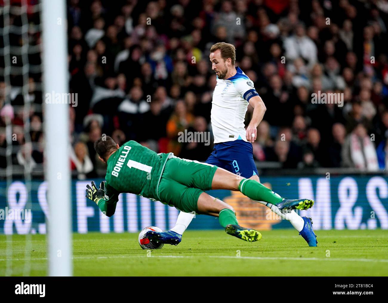 England's Harry Kane collides with Malta goalkeeper Henry Bonello ...