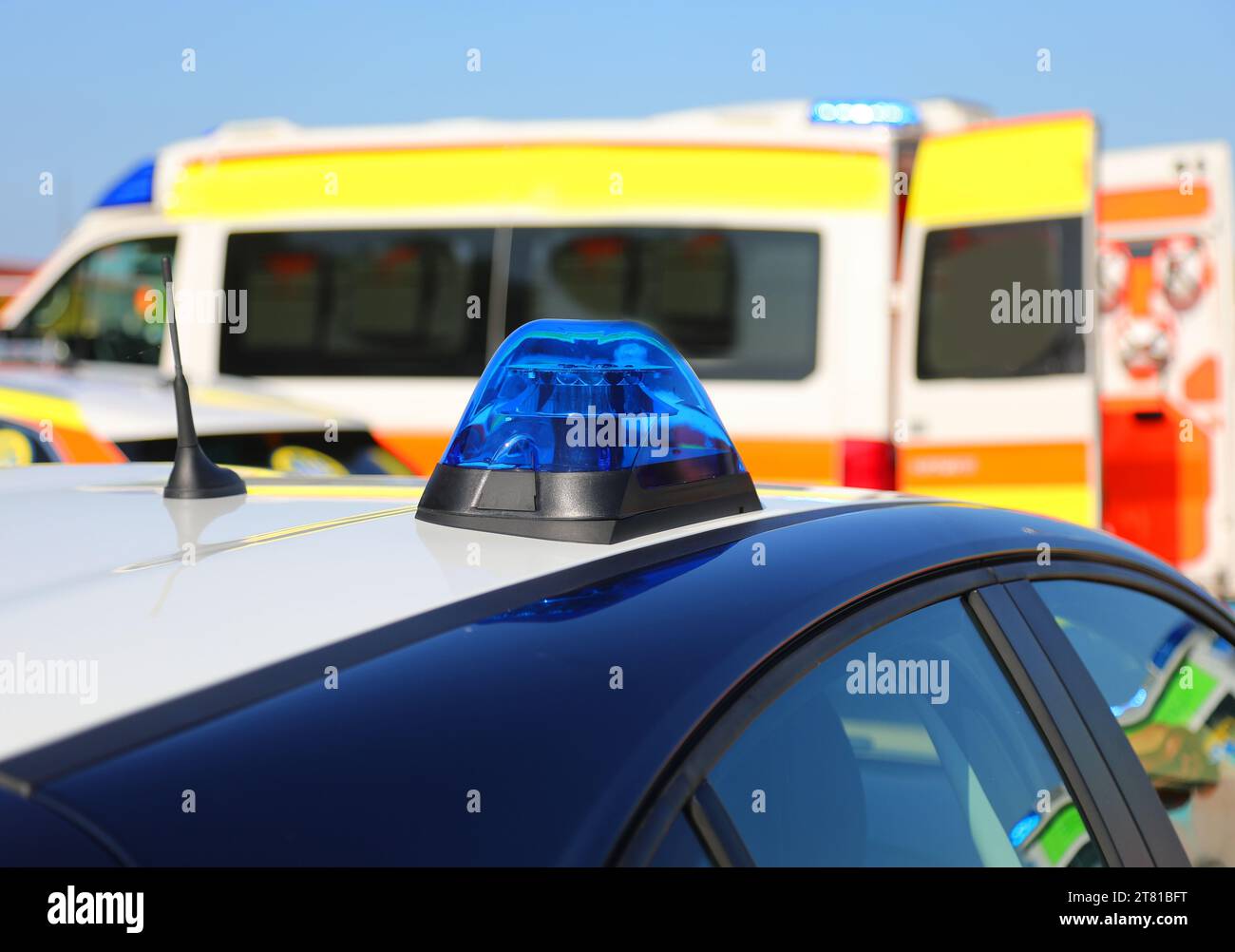 Blue Sirens Of The Police Car And The Ambulance In The Background After The Serious Road