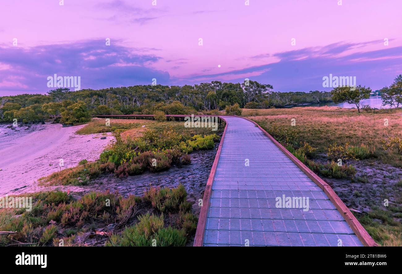 A raised walkway follows the shoreline of the bay at Paradise Point ...