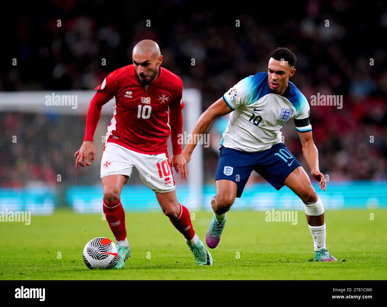 England's Trent Alexander-Arnold (right) and Malta's Teddy Teuma battle ...