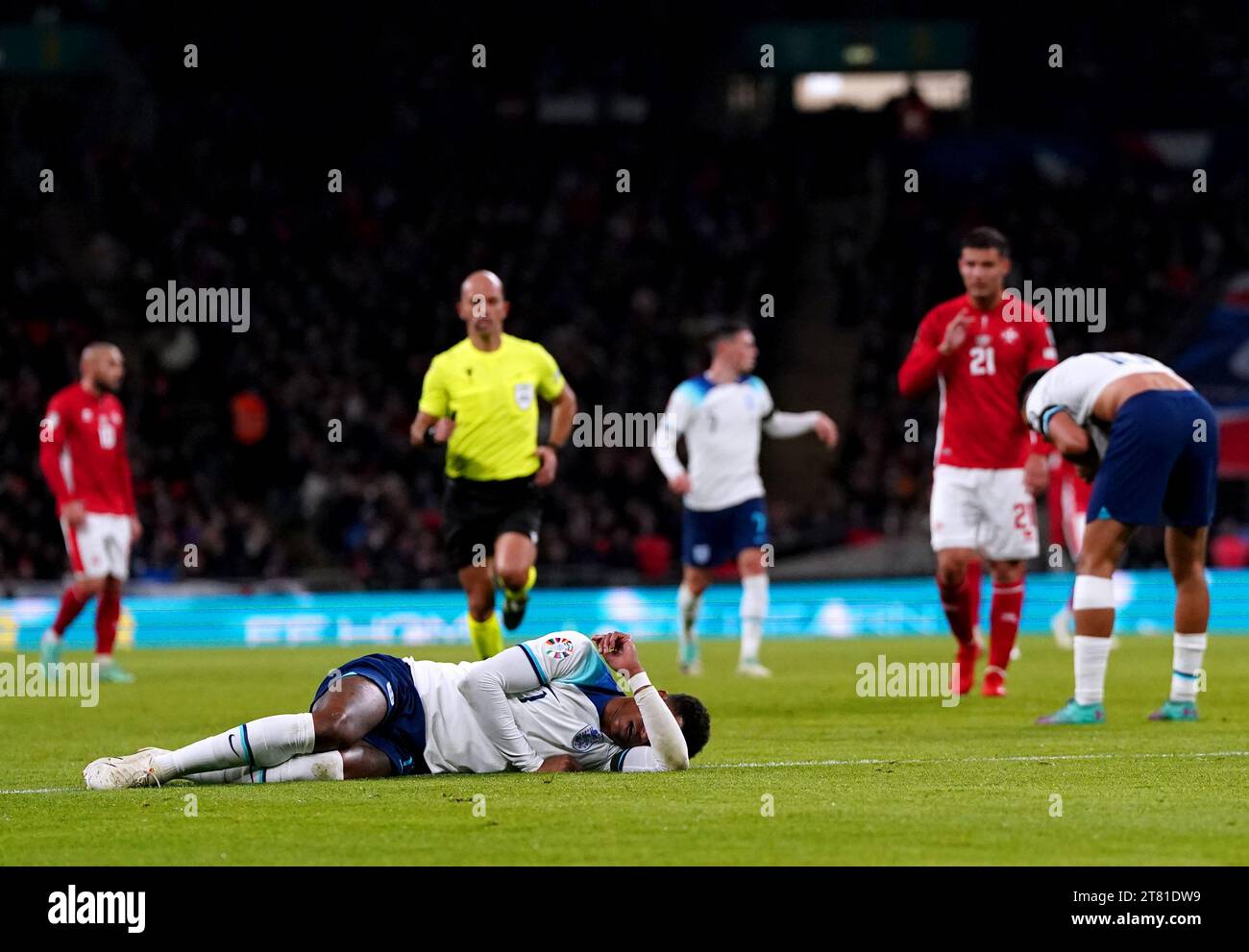 England's Marcus Rashford lies injured on the pitch during the UEFA ...