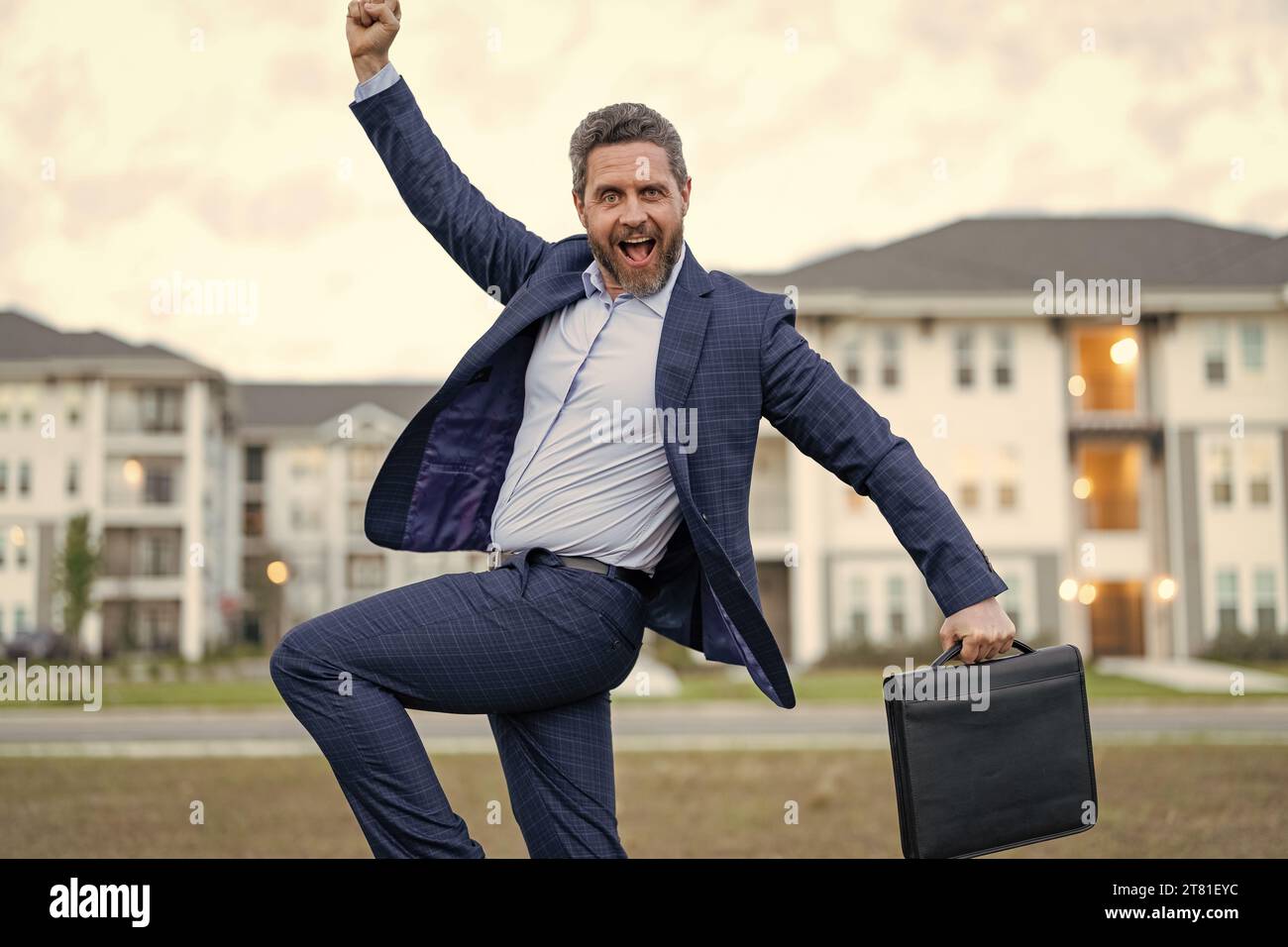 glad real estate business man. real estate business man with briefcase ...