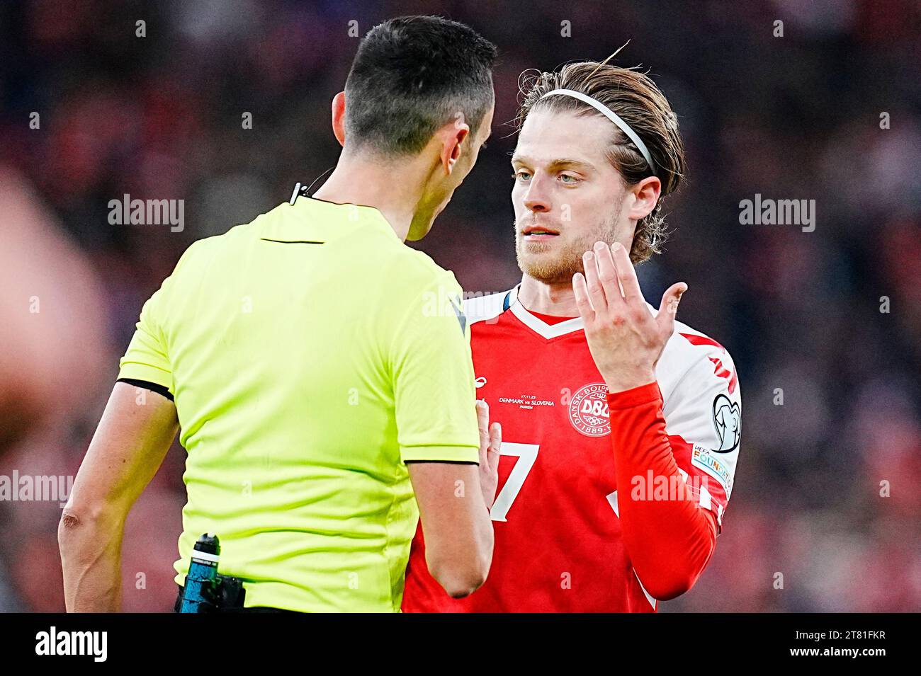 Denmark's Mathias Jensen and referee Jose Sanchez arguing during the ...
