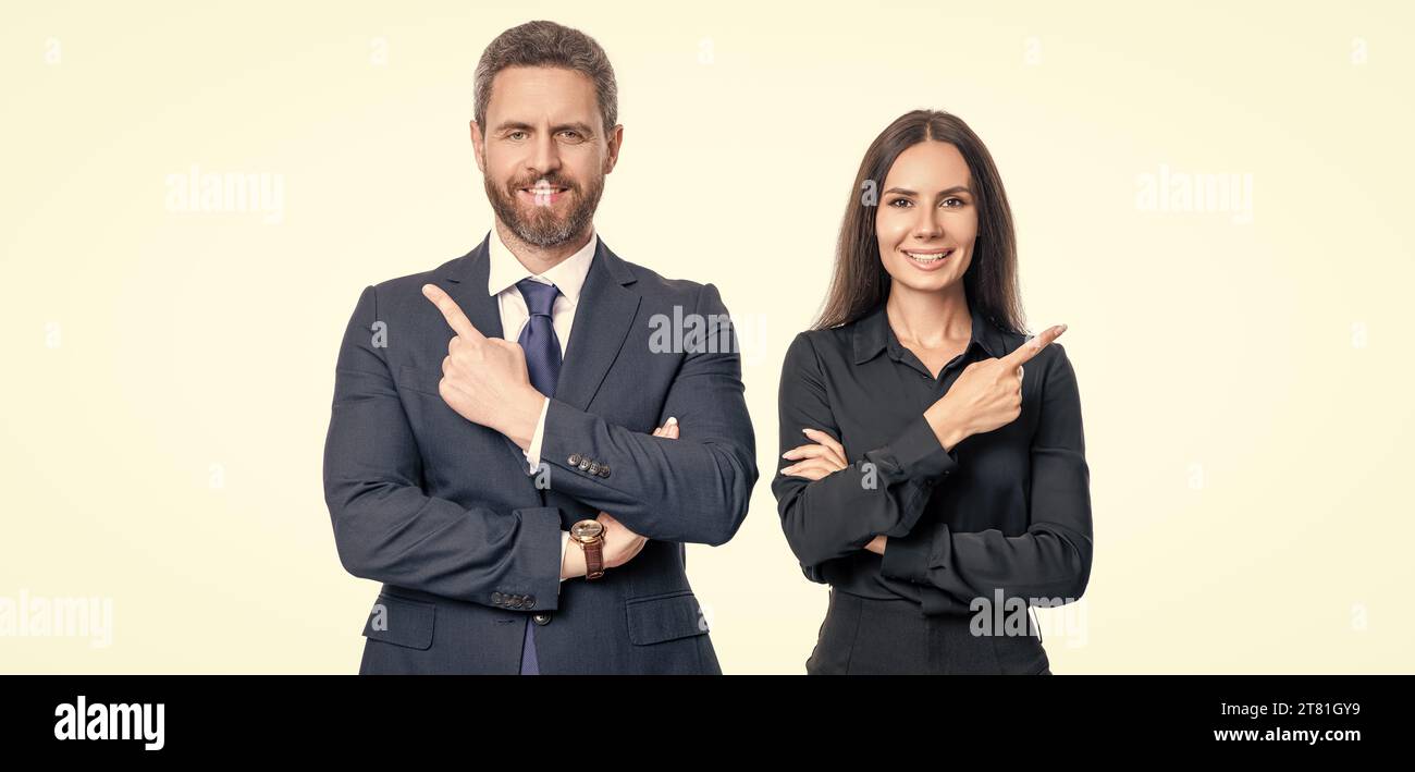 couple of business partners in formalwear, point finger. photo of ...