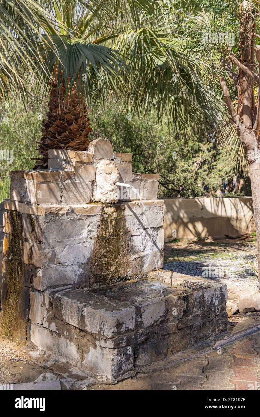 Zaghouan, Tunisia. Water flowing from a fountain at the ruins of the ...