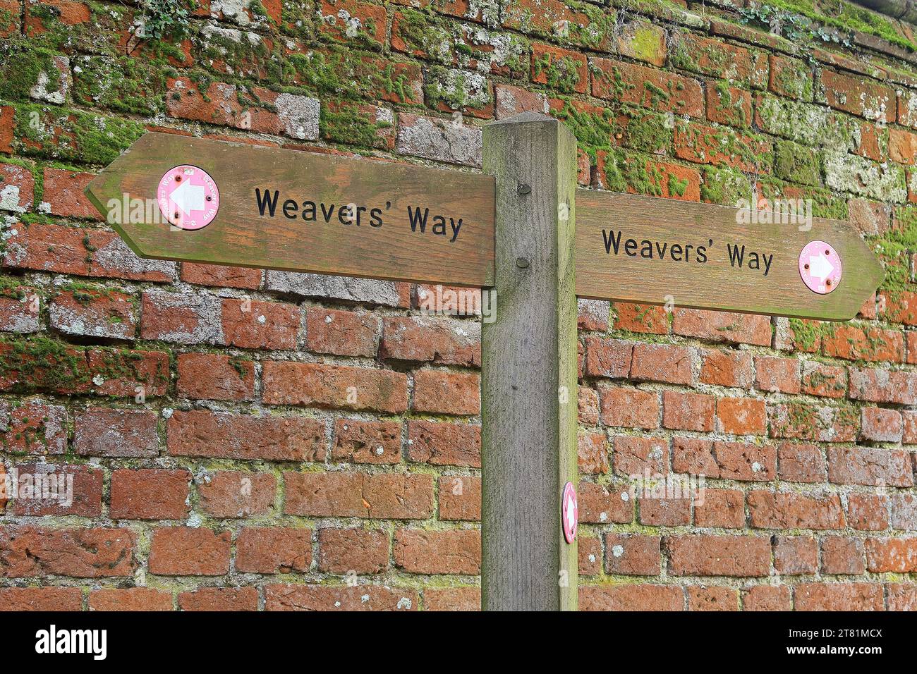 A wooden signpost showing the Weavers Way Stock Photo - Alamy