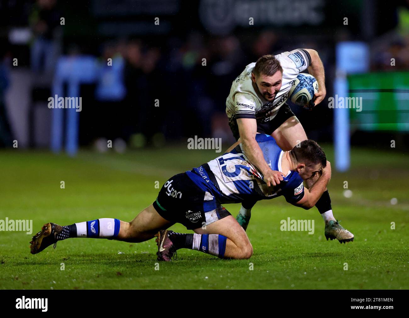 Bristol Bears' Richard Lane evades being tackled by Bath Rugby's Matt ...
