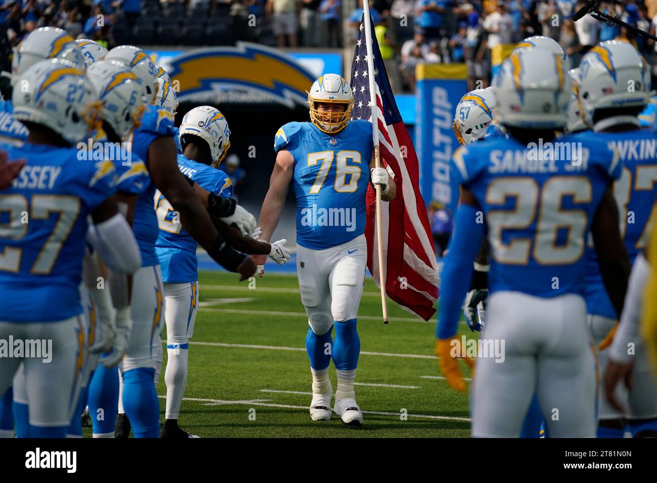 Los Angeles Chargers center Will Clapp (76) runs on to the field before ...