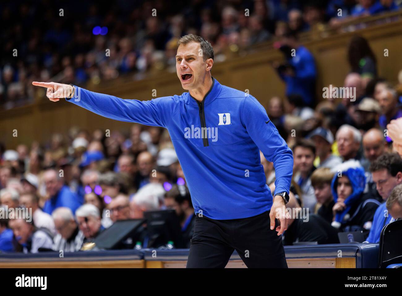 Duke head coach Jon Scheyer shouts towards the court during the first ...