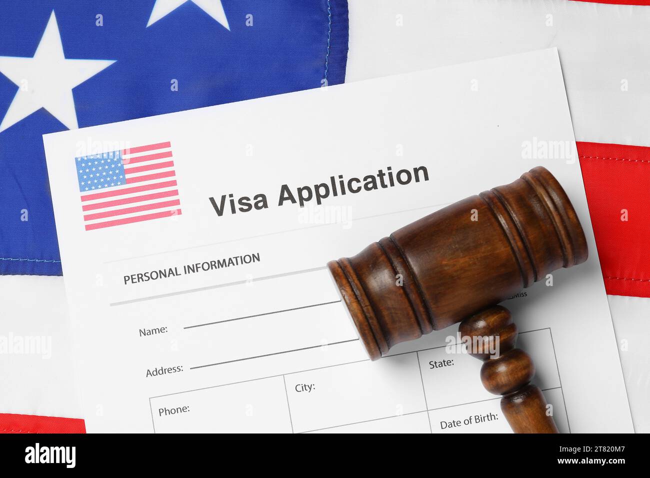Immigration to USA. Visa application form and wooden gavel on flag, top ...