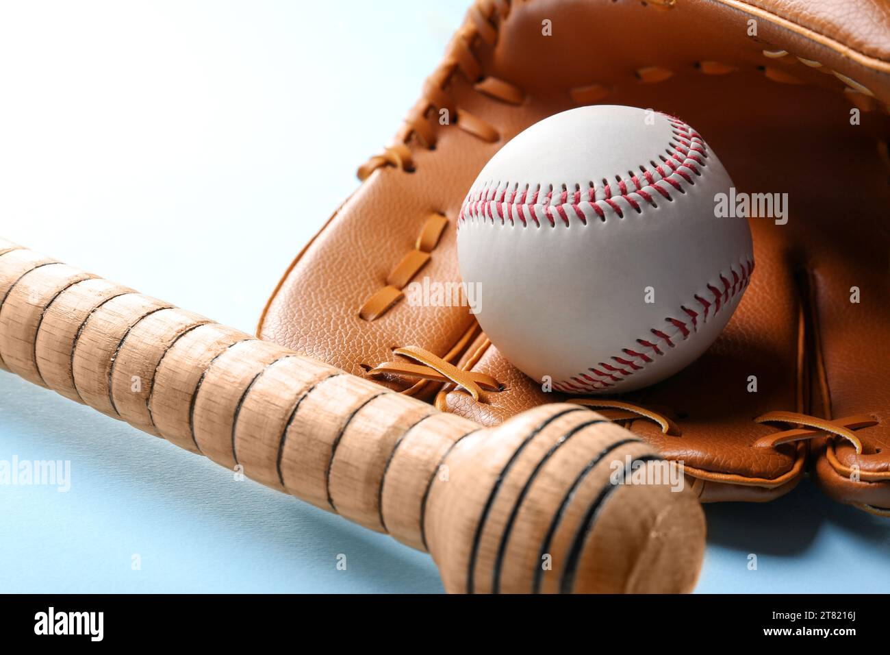 Baseball glove, bat and ball on white background, closeup Stock Photo ...