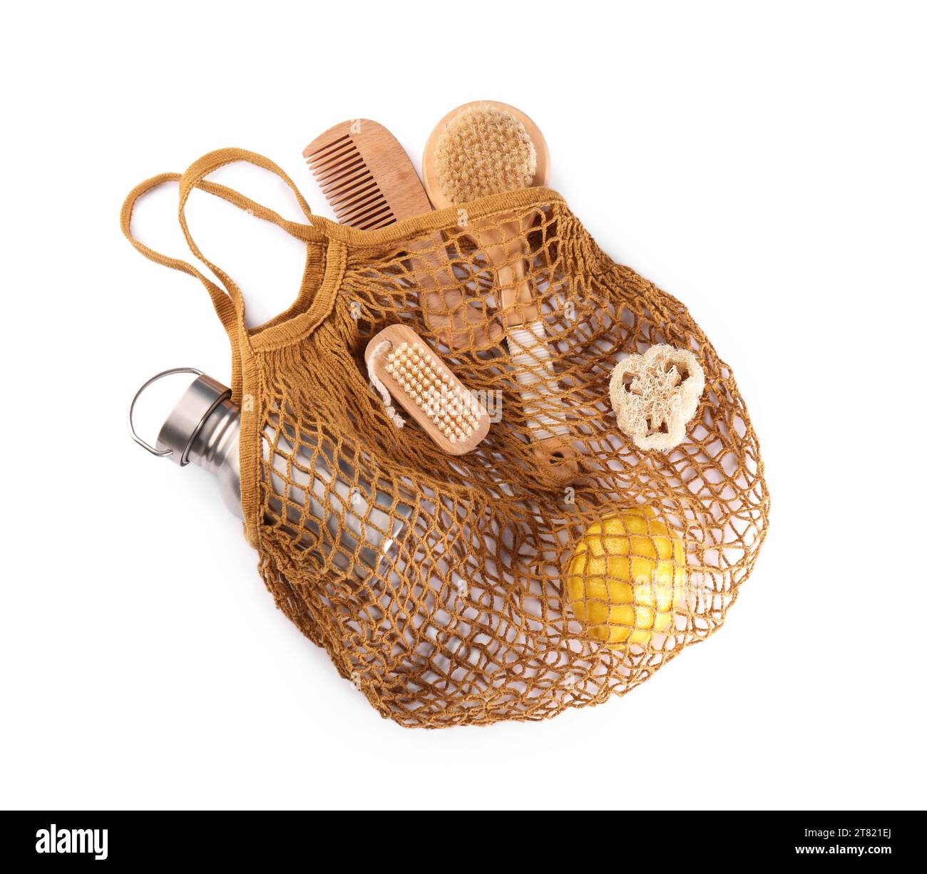 Fishnet bag with different items isolated on white, top view. Conscious ...
