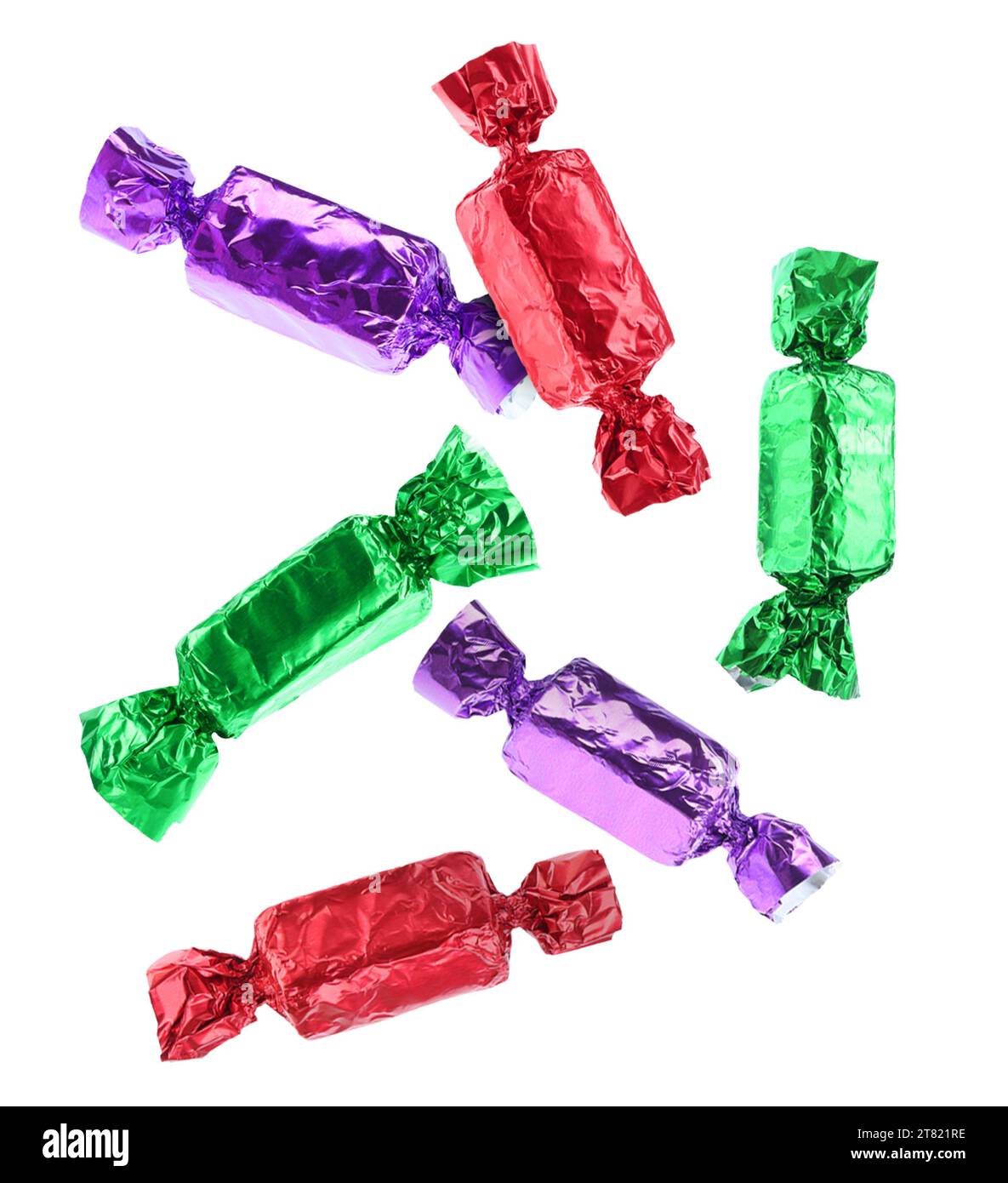 Tasty candies in bright wrappers falling on white background Stock ...