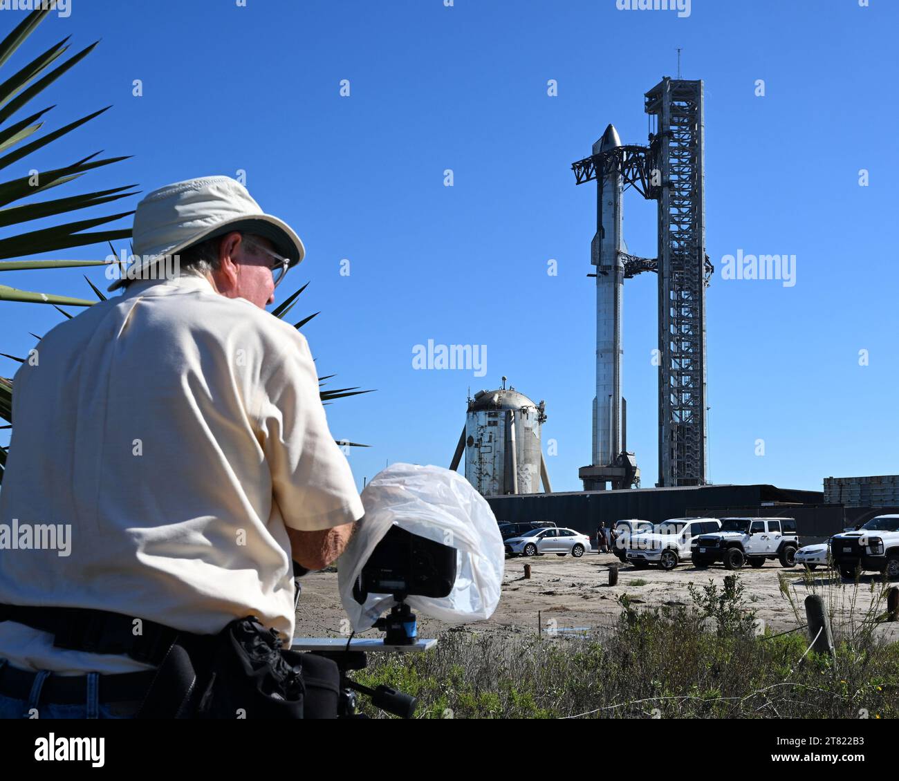 A media photographer sets remote cameras as the SpaceX "Starship ...