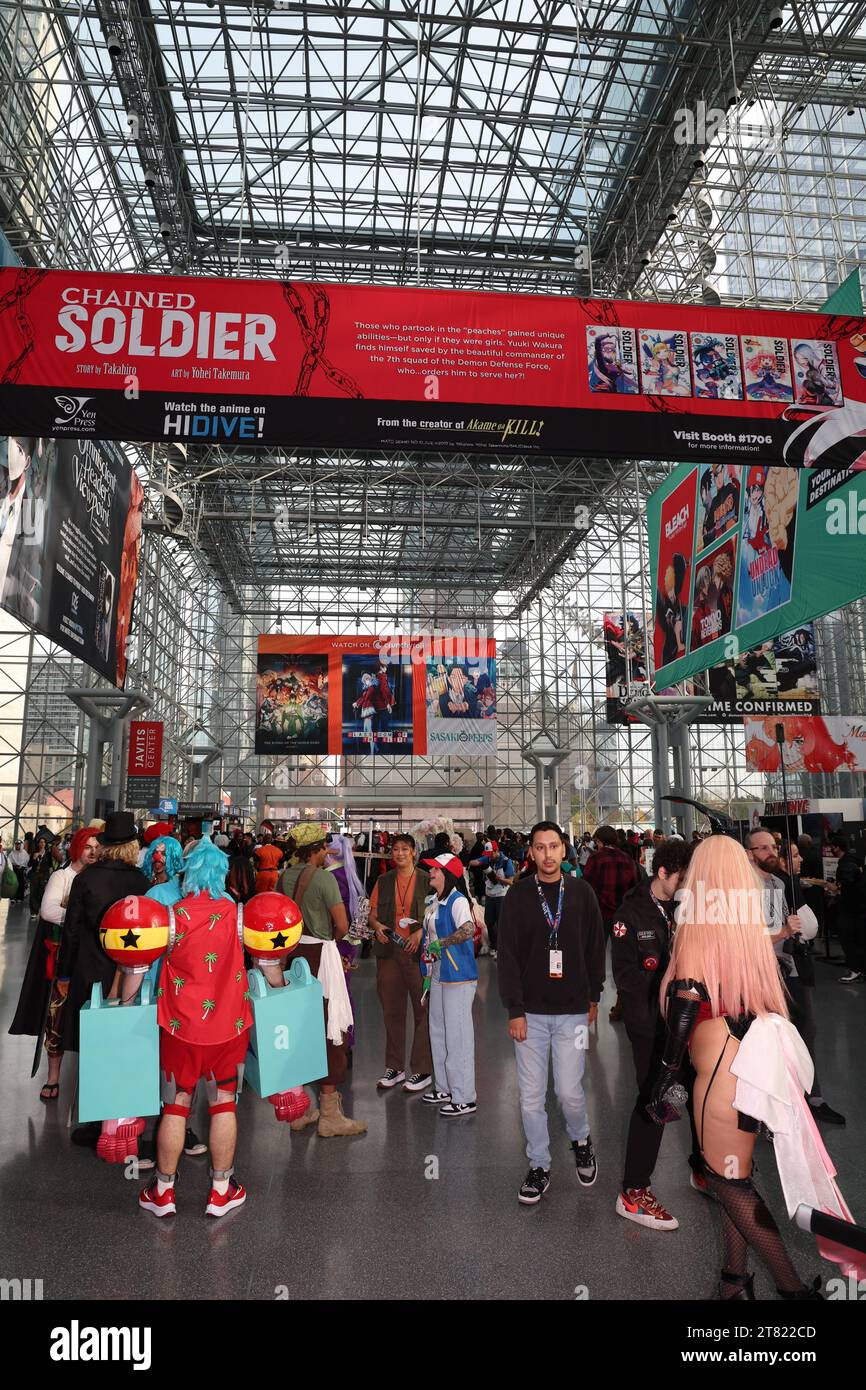 People attend the Anime NYC exhibition hall at the Jacob Javits Center ...