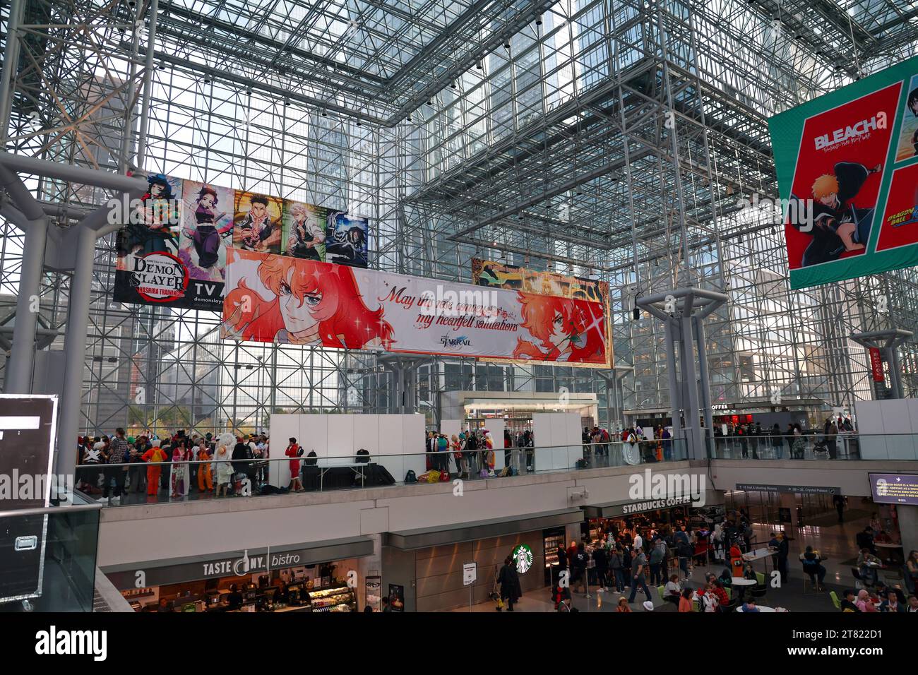 People attend the Anime NYC exhibition hall at the Jacob Javits Center ...