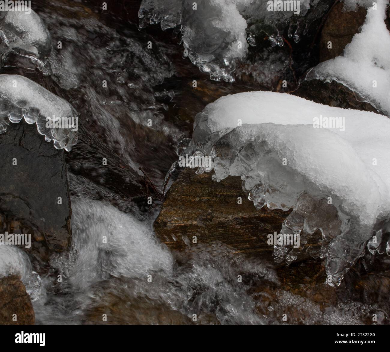 Snow ice covering rocks hi-res stock photography and images - Alamy
