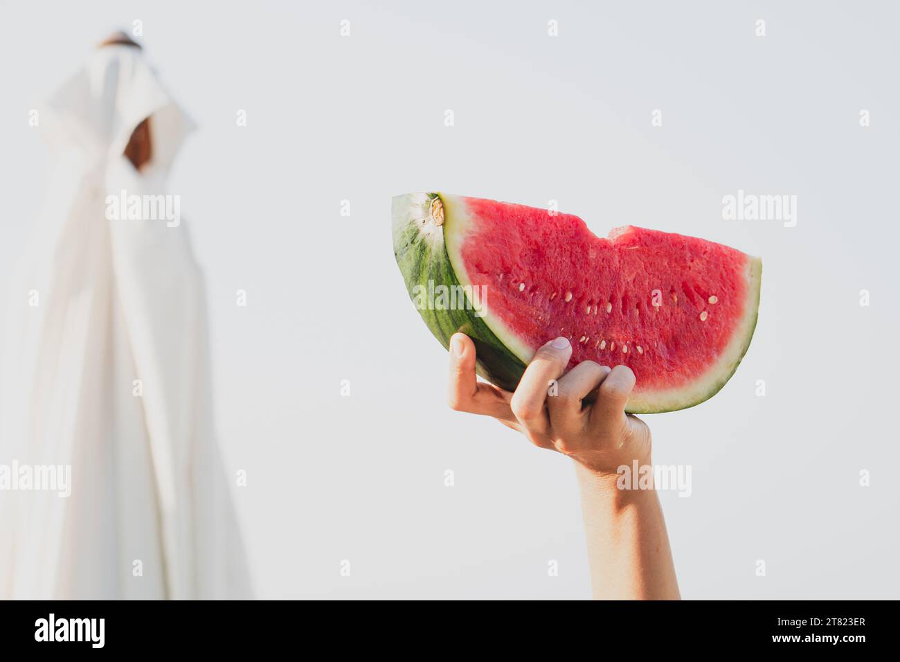 fresh Watermelon slice on a beach Stock Photo - Alamy