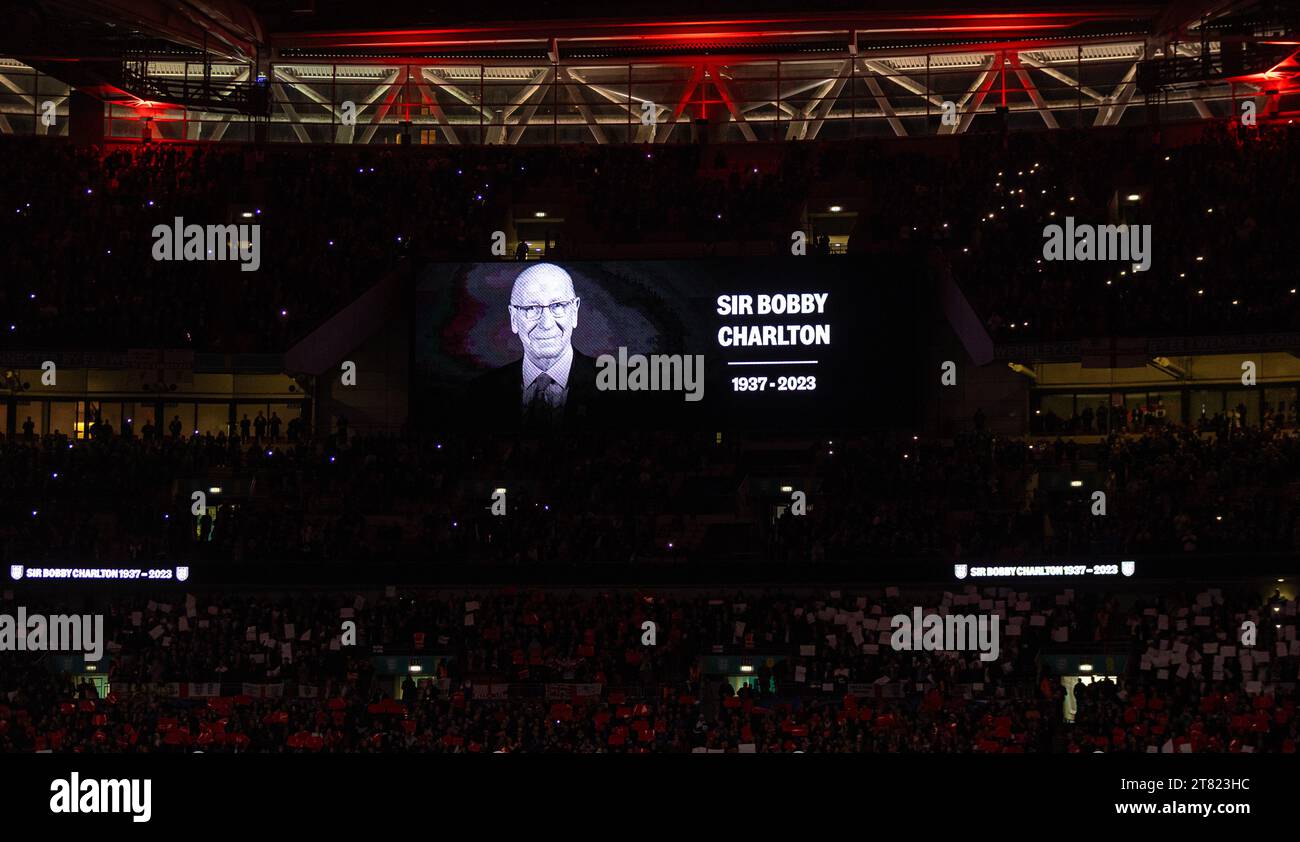 London, UK. 18th Nov, 2023. Screen displays an image in honor of late ...