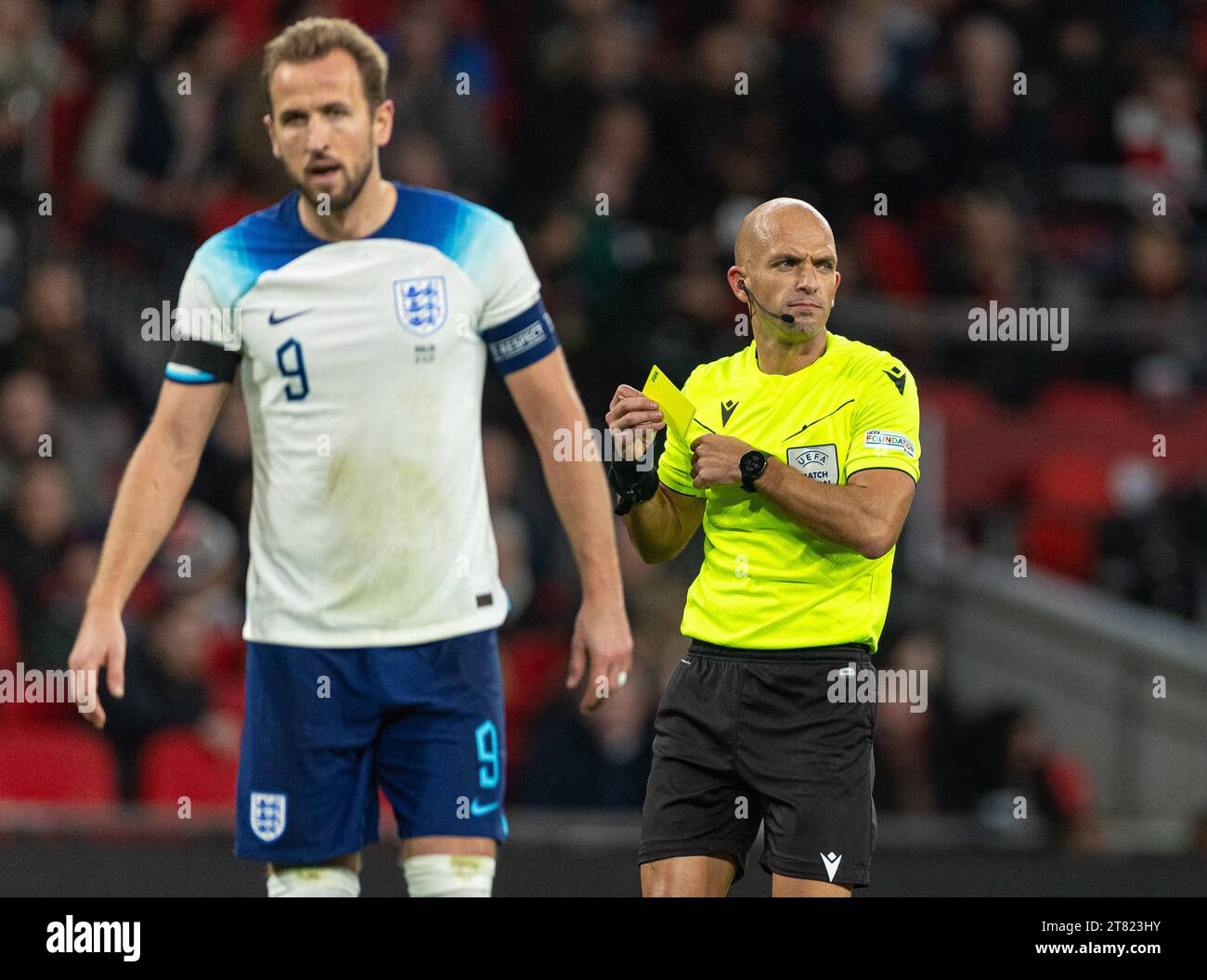 London, UK. 18th Nov, 2023. Harry Kane (L) of England reacts after ...