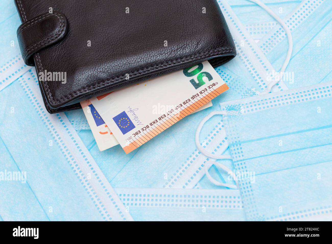 Black Men's Wallet with Euro Money Inside on the Blue Disposable ...