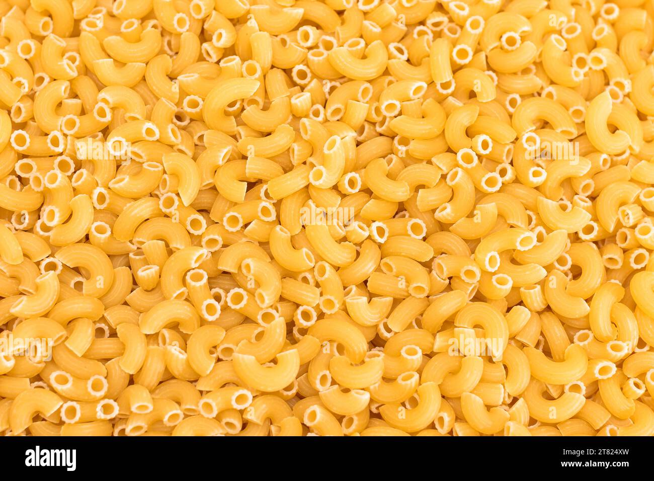 Uncooked Chifferi Rigati Pasta Background. Fat and Unhealthy Food ...