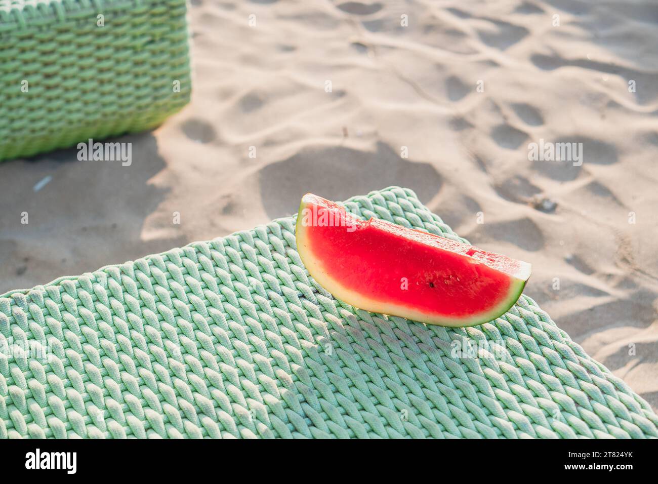 watermelon slice on a beach Stock Photo - Alamy