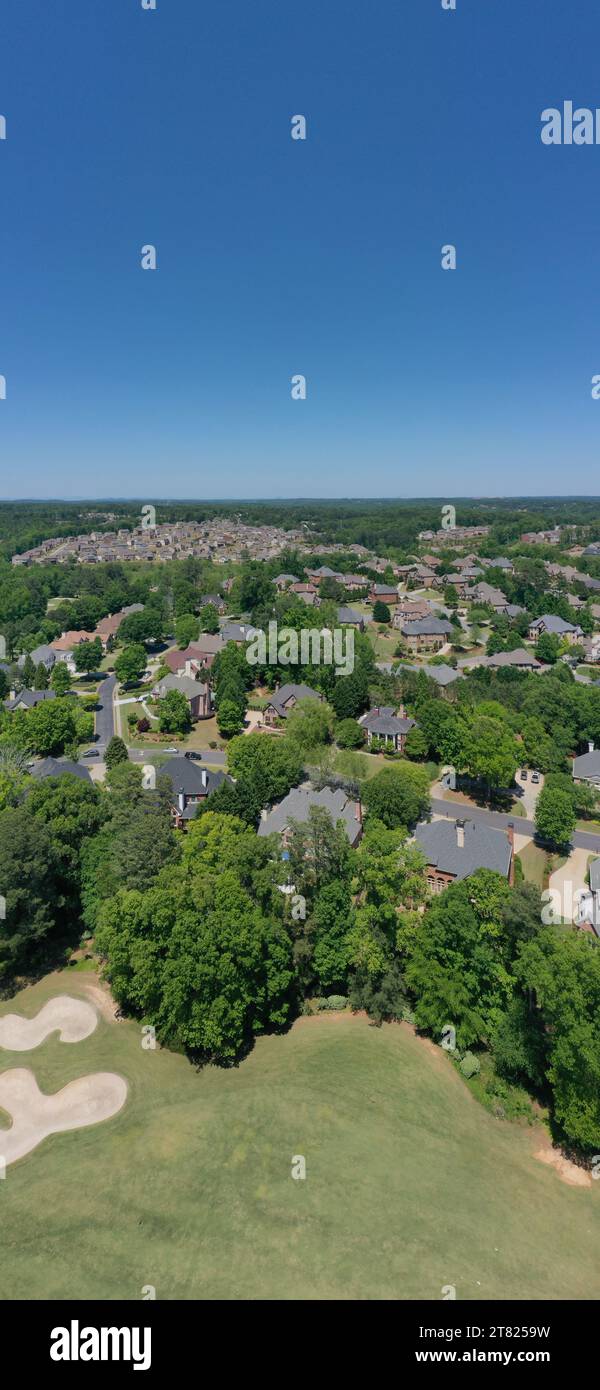 Vertical panorama Aerial view of an upscale subdivision in suburbs of ...