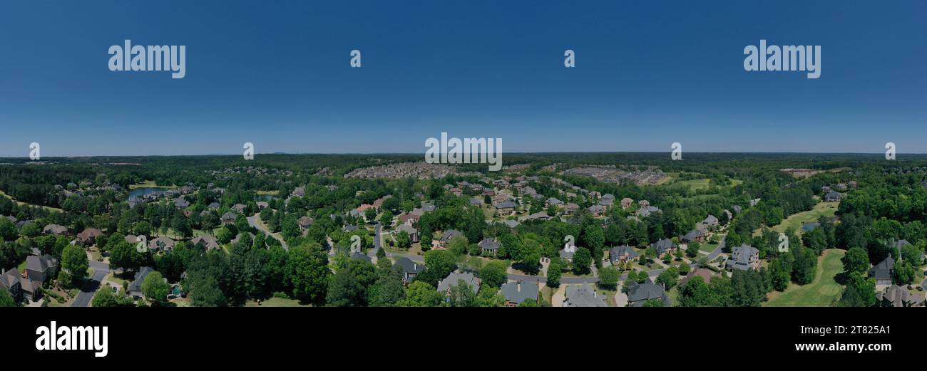 Aerial 180 degree panorama of an upscale subdivision in suburbs of ...