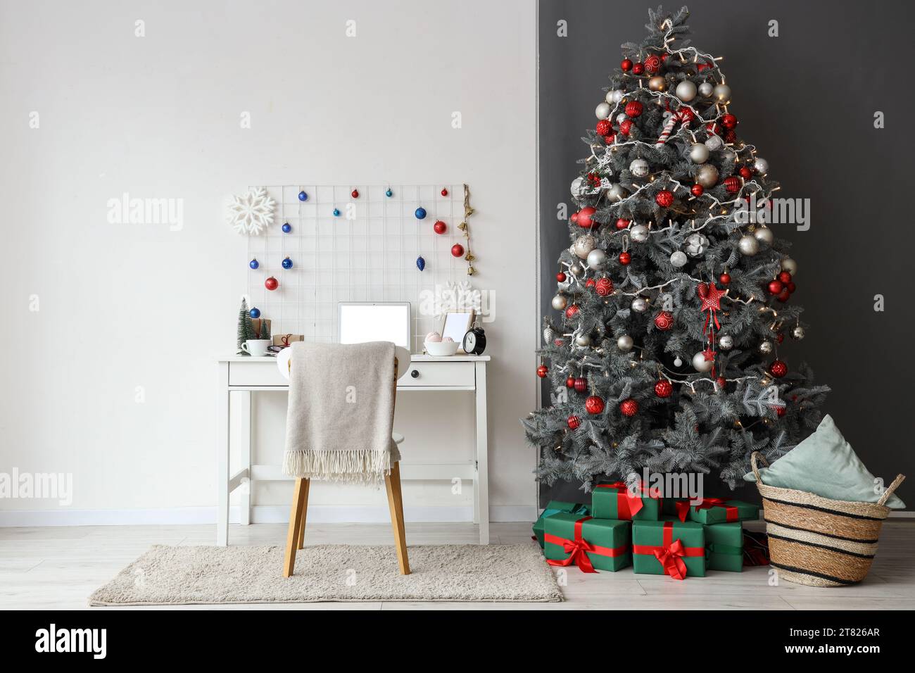 Interior of office with workplace, presents and Christmas tree Stock ...