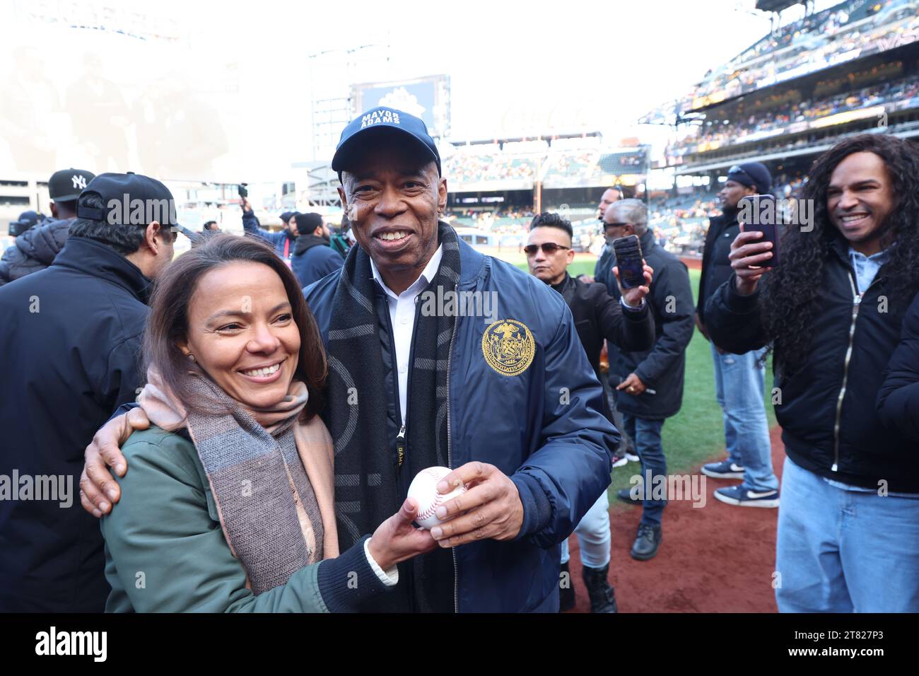 New York City Mayor Eric Adams takes photos with fans before the ...