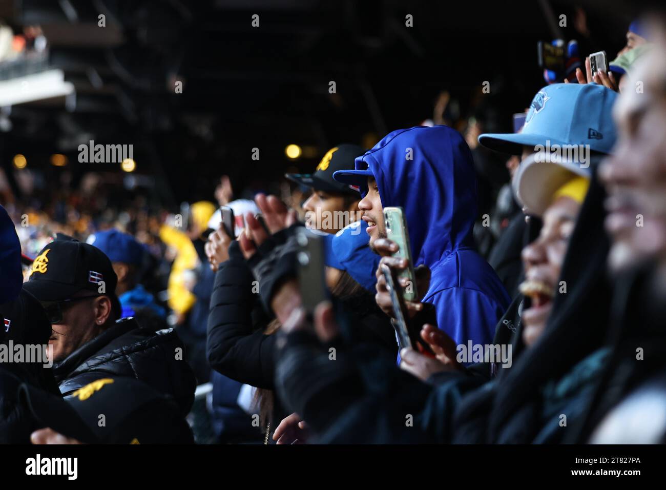 Fans enjoy themselves during the baseball game between the Las Águilas ...