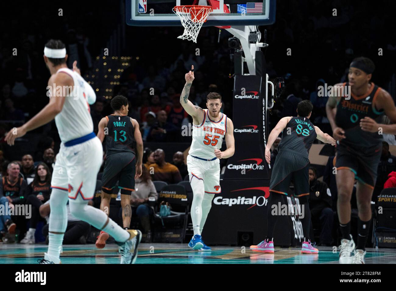 New York Knicks center Isaiah Hartenstein (55) points to the basket ...