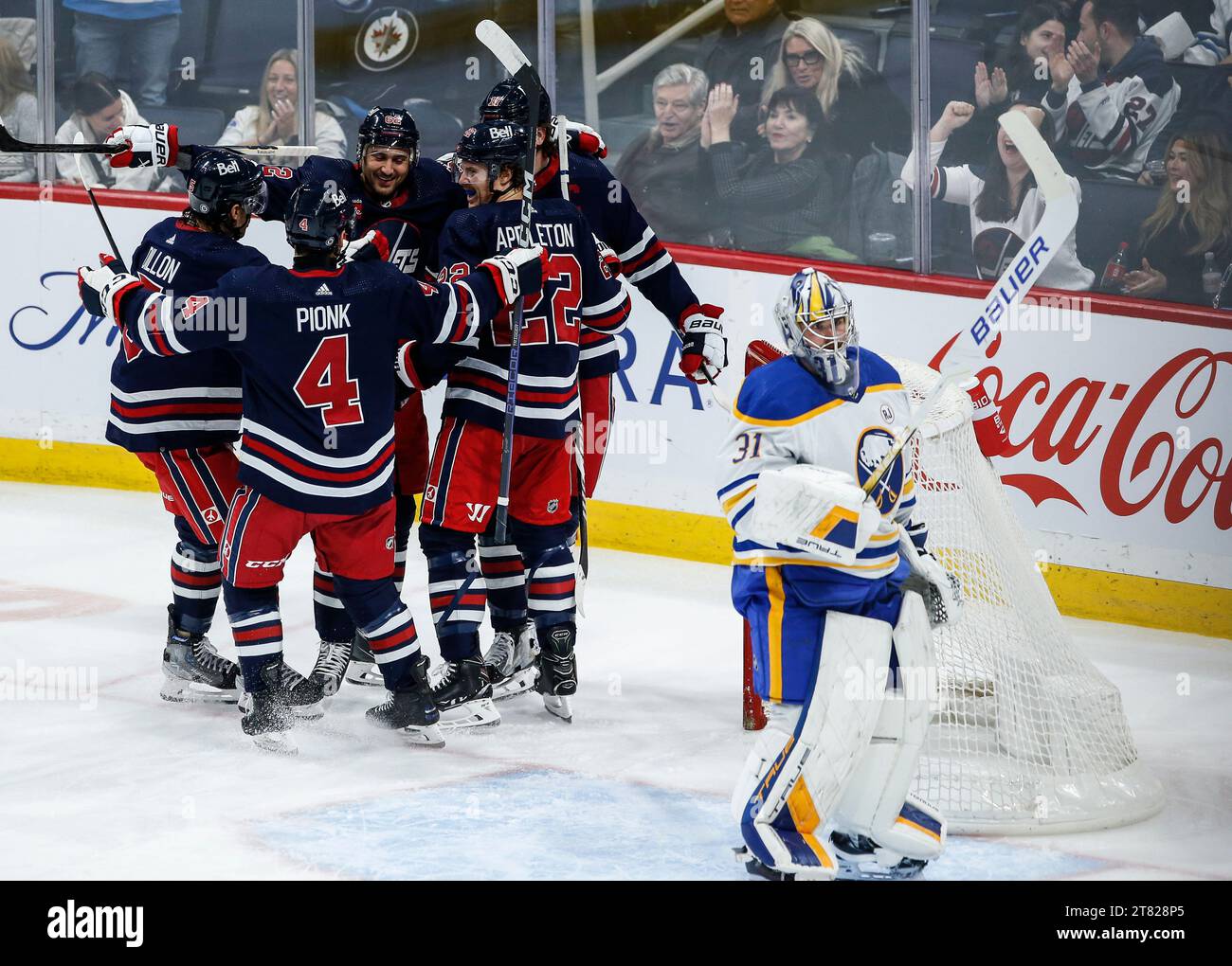 Winnipeg Jets' Brenden Dillon (5), Neal Pionk (4), Nino Niederreiter ...