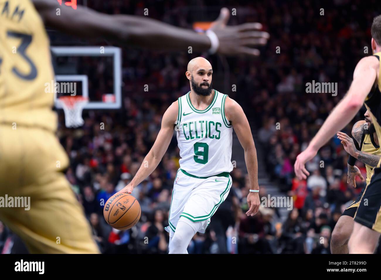 Boston Celtics guard Derrick White brings the ball up against the ...