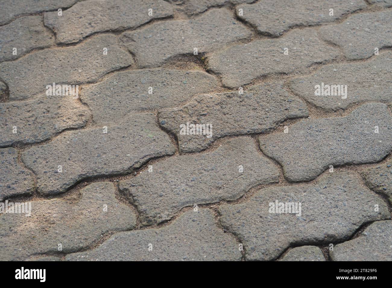 Gray stamped concrete pavement outdoor Stock Photo - Alamy