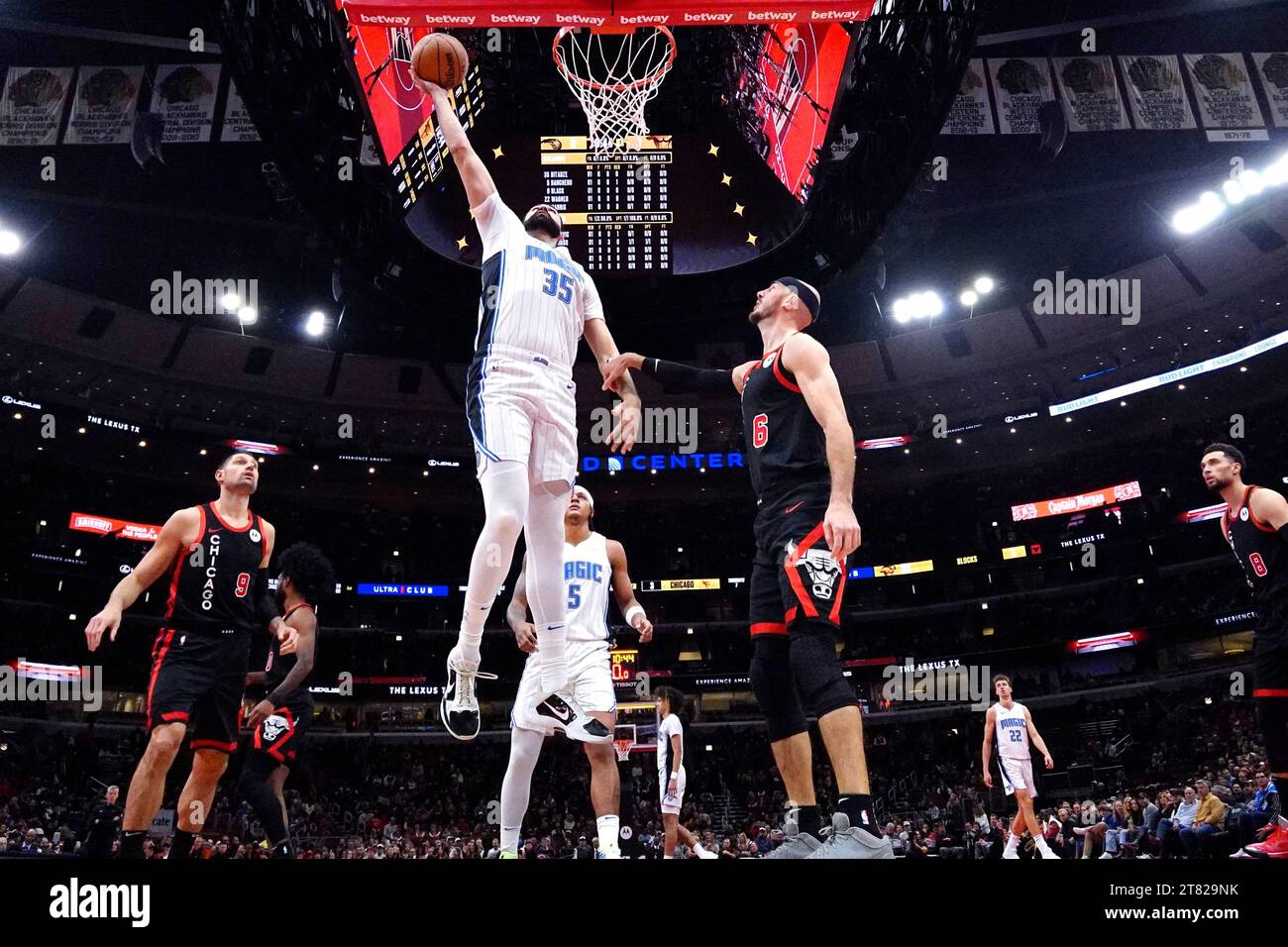Orlando Magic center Goga Bitadze (35) drives to the basket as Chicago ...