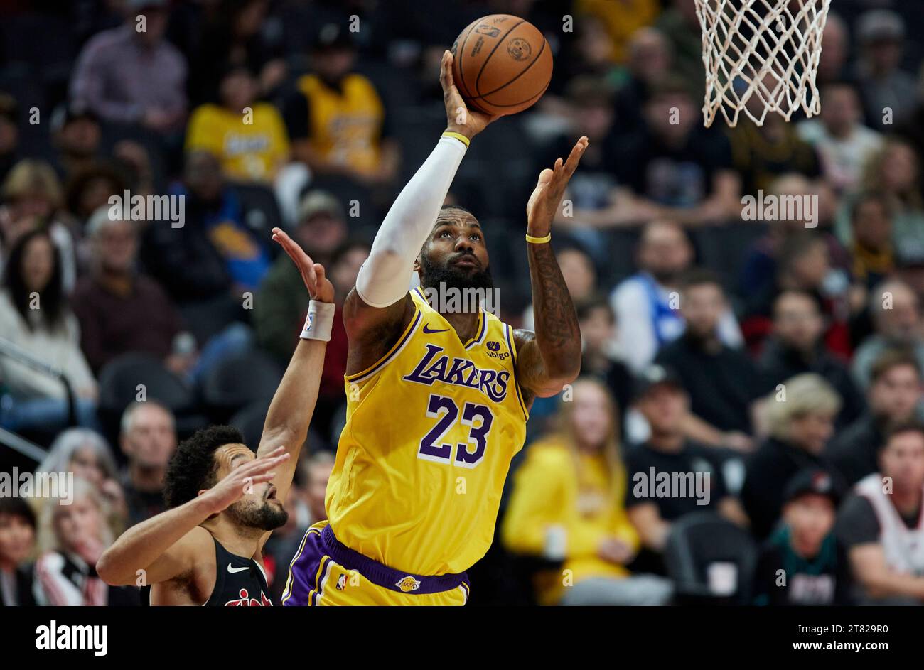 los-angeles-lakers-forward-lebron-james-shoots-next-to-portland-trail