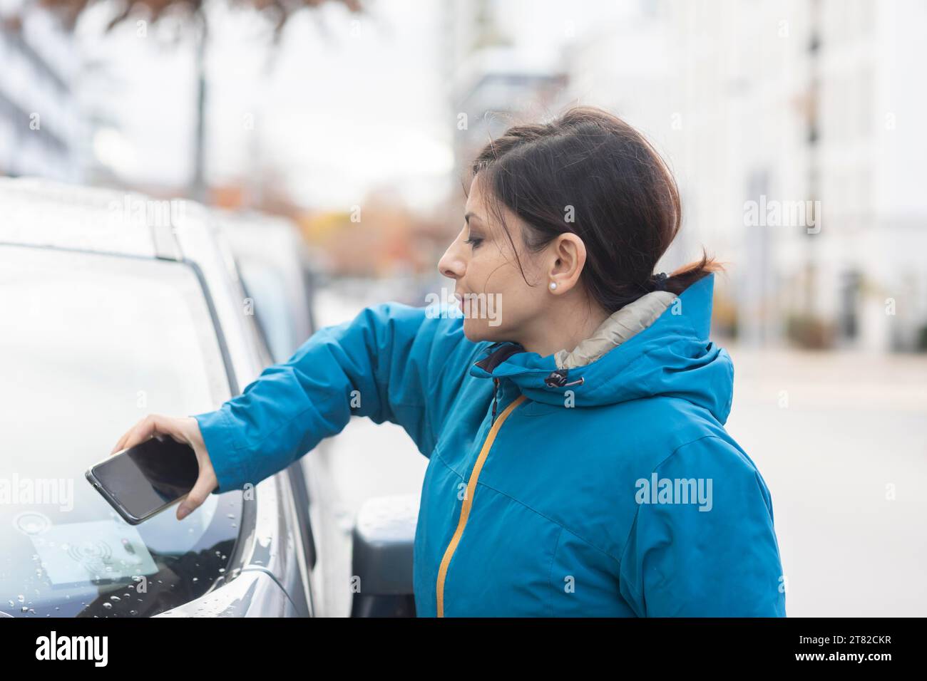 Woman uses car sharing hi-res stock photography and images - Alamy