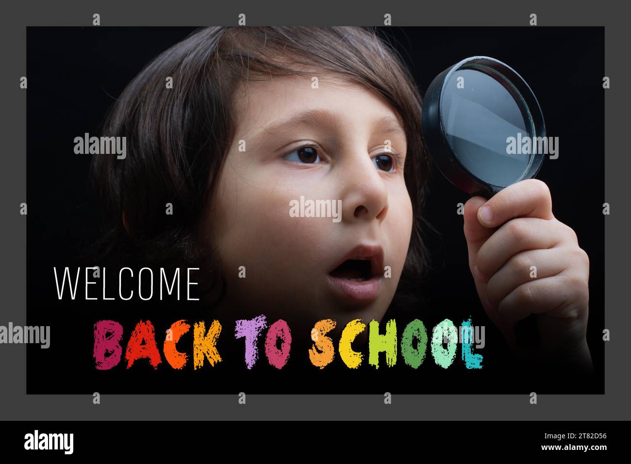 Boy with magnifying glass ready to explore Stock Photo - Alamy