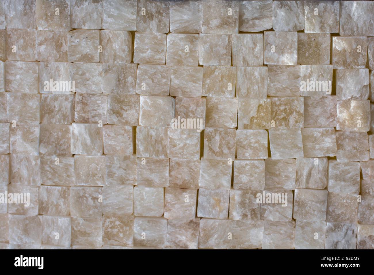 Decorative cubic stone wall as background texture Stock Photo - Alamy