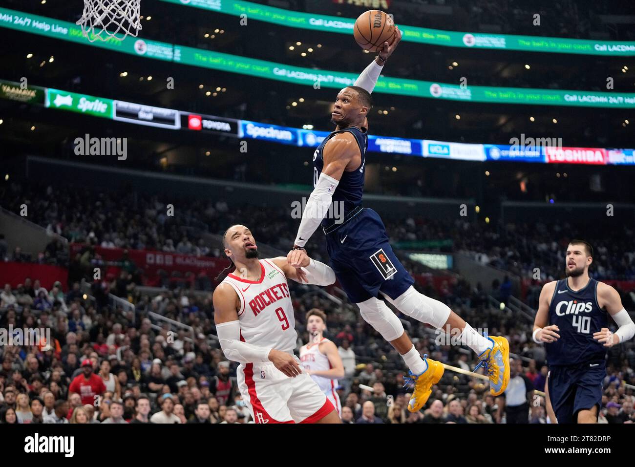 Los Angeles Clippers guard Russell Westbrook, center, attempts a dunk ...