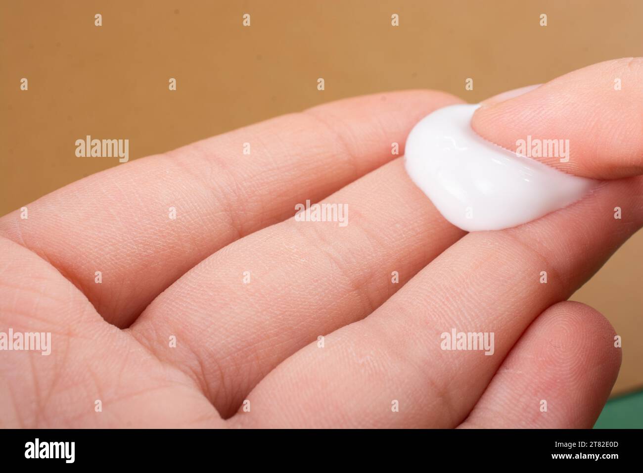 Shaving foam in hand against color background Stock Photo - Alamy
