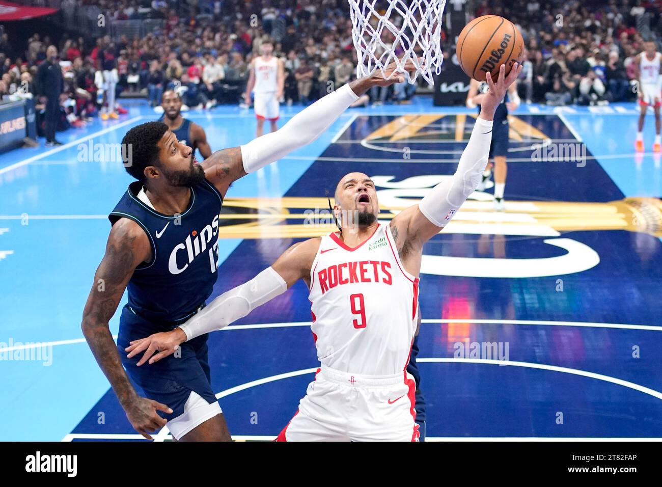 Houston Rockets forward Dillon Brooks, right, shoots as Los Angeles ...