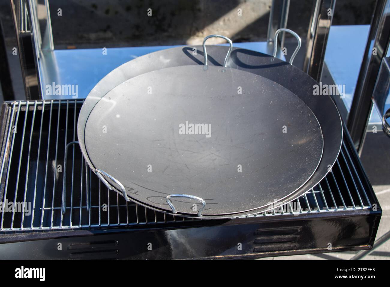Set of new metal pans as cookware Stock Photo - Alamy