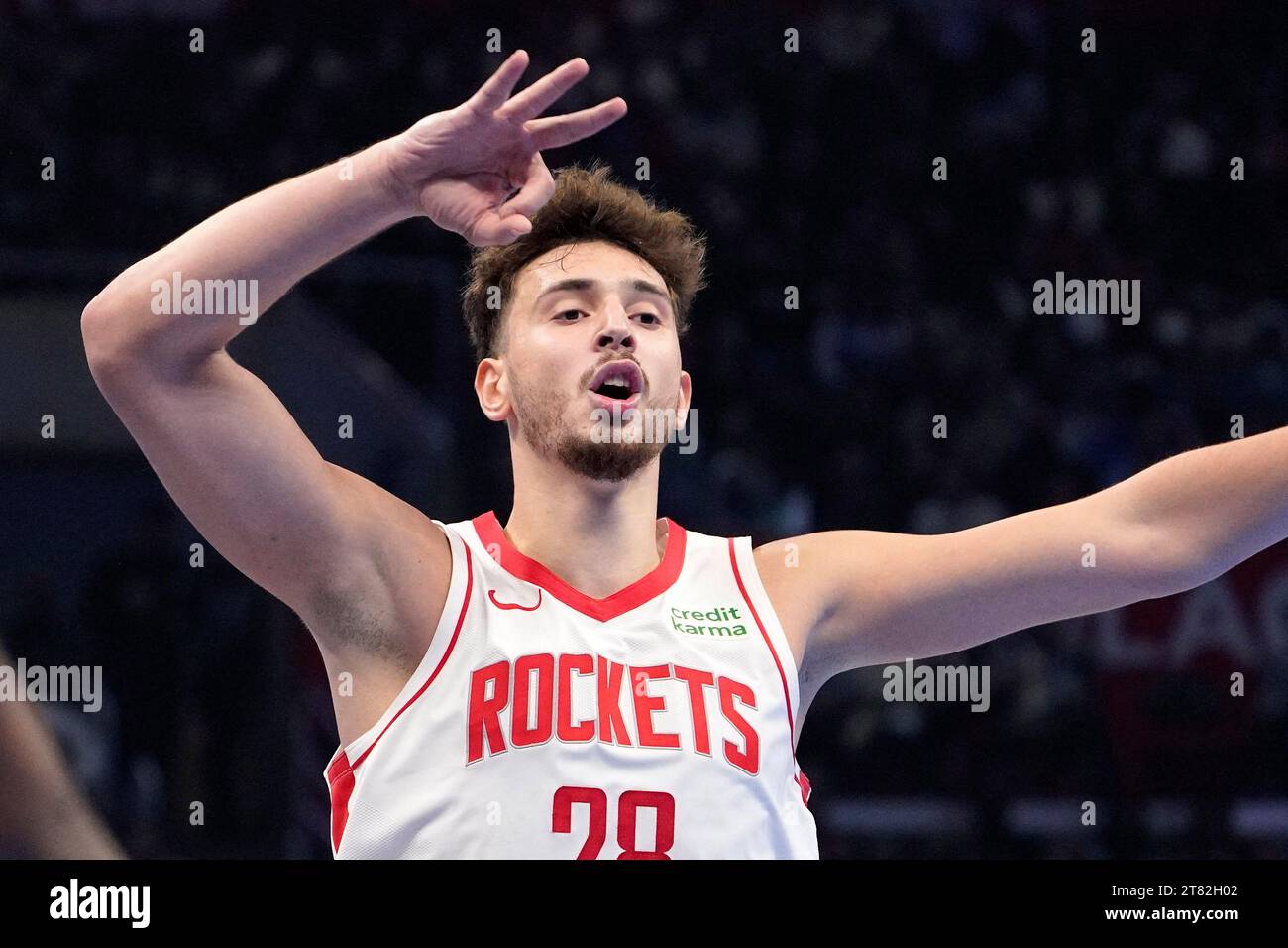 Houston Rockets center Alperen Sengun celebrates as a timeout is called ...